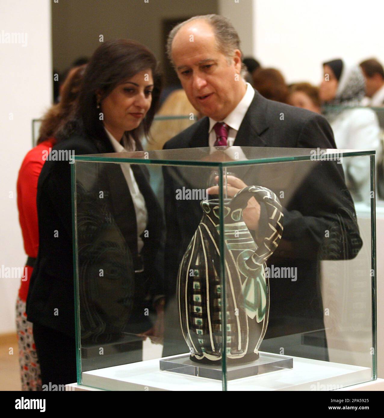 Visitors looks at a pitcher made by the Spanish artist Pablo Picasso ...