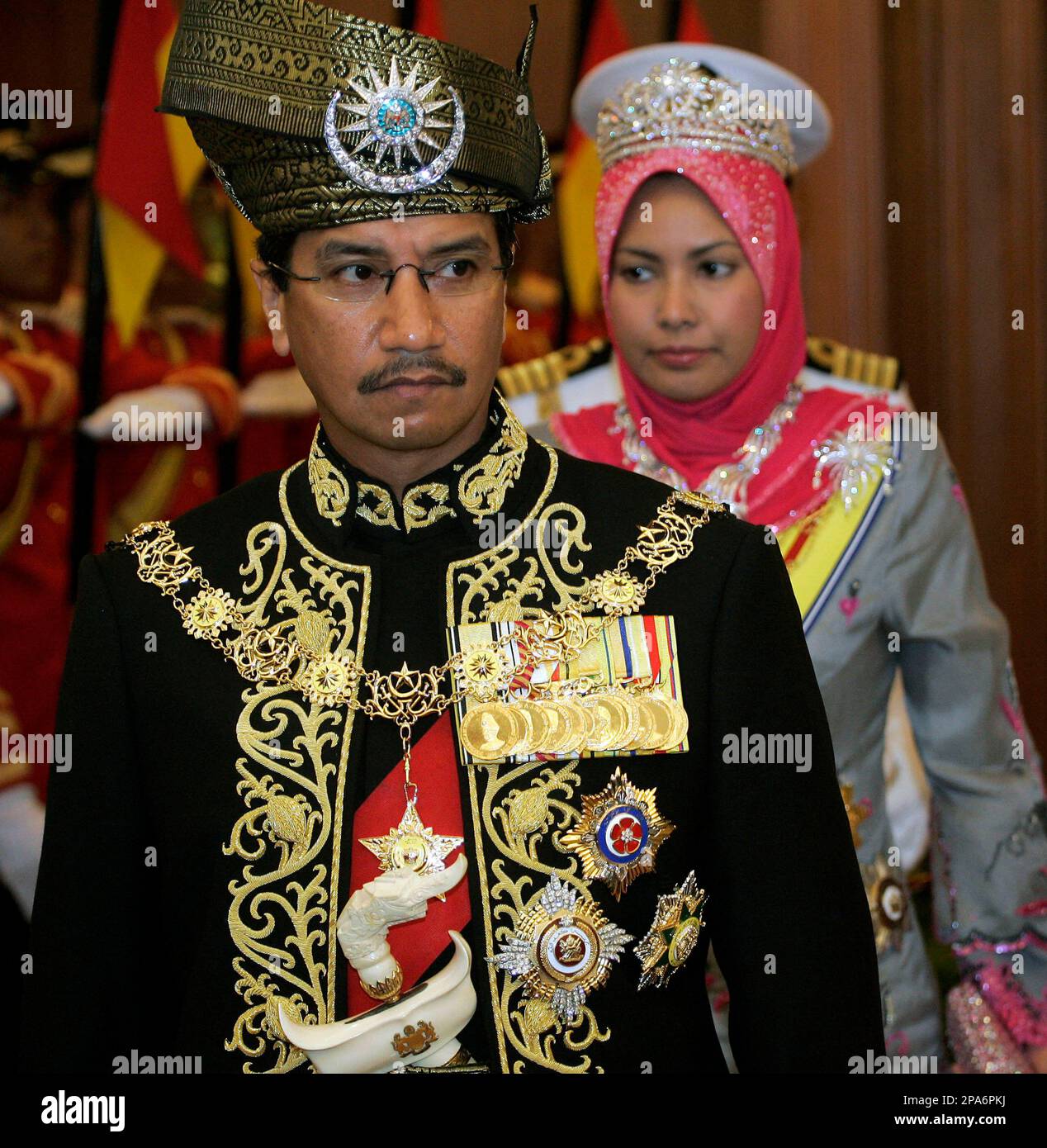 Malaysia's King Sultan Mizan Zainal Abidin and his wife Queen Nur Zahirah walk out from the ...