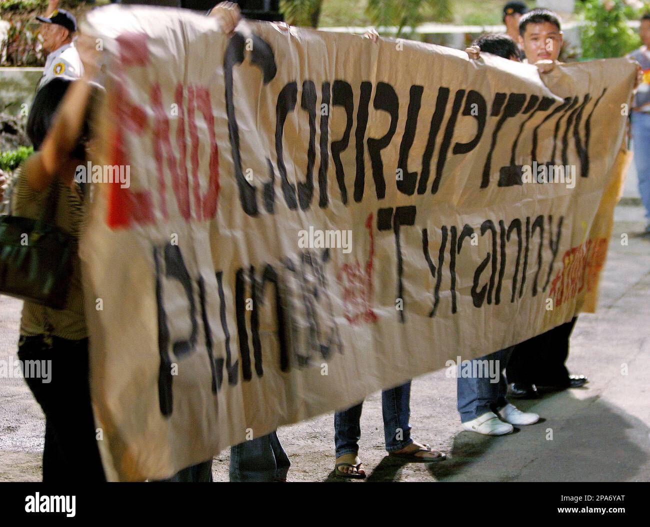 Filipino students hold slogans as they stage a rally during their ...