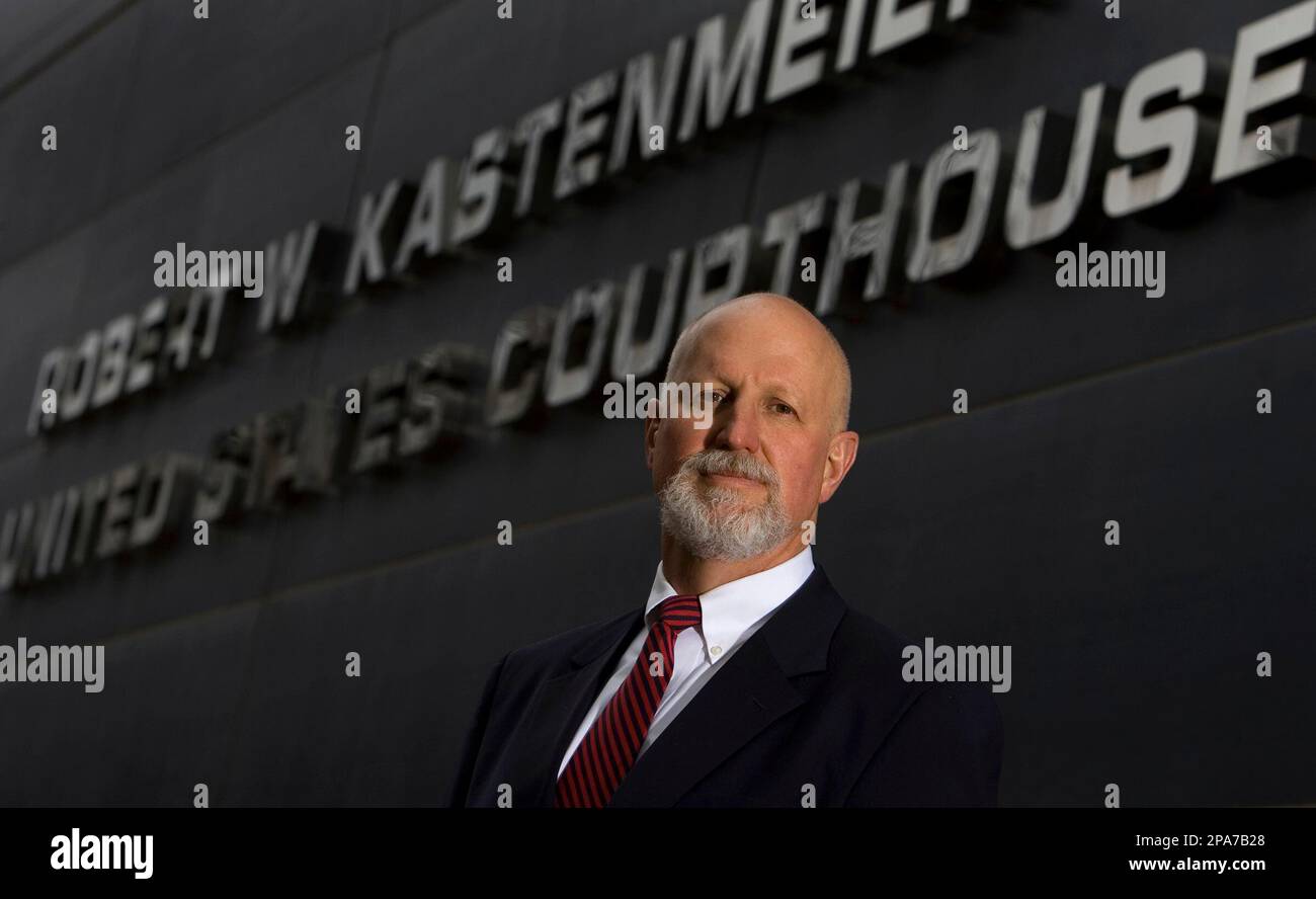 Assistant U.S. Attorney Peter Jarosz stands in front of the Robert W ...