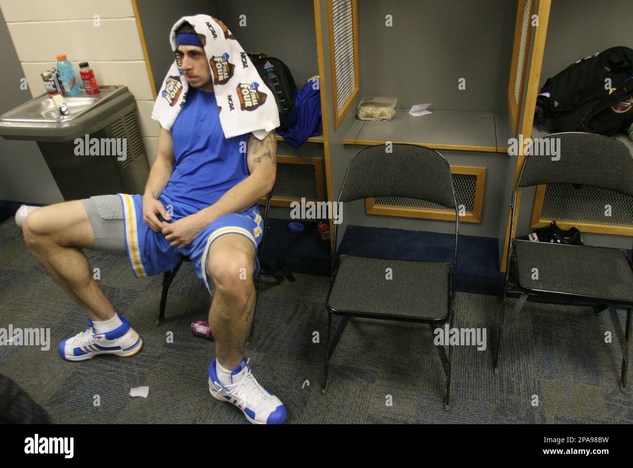 UCLA's Lorenzo Mata-Real (14) sits in front of his locker after loosing ...
