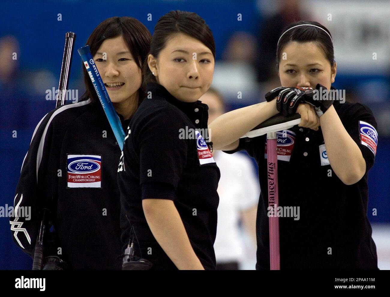 Team Japan's third Mari Motohashi, center, second Mayo Yamaura ,right ...