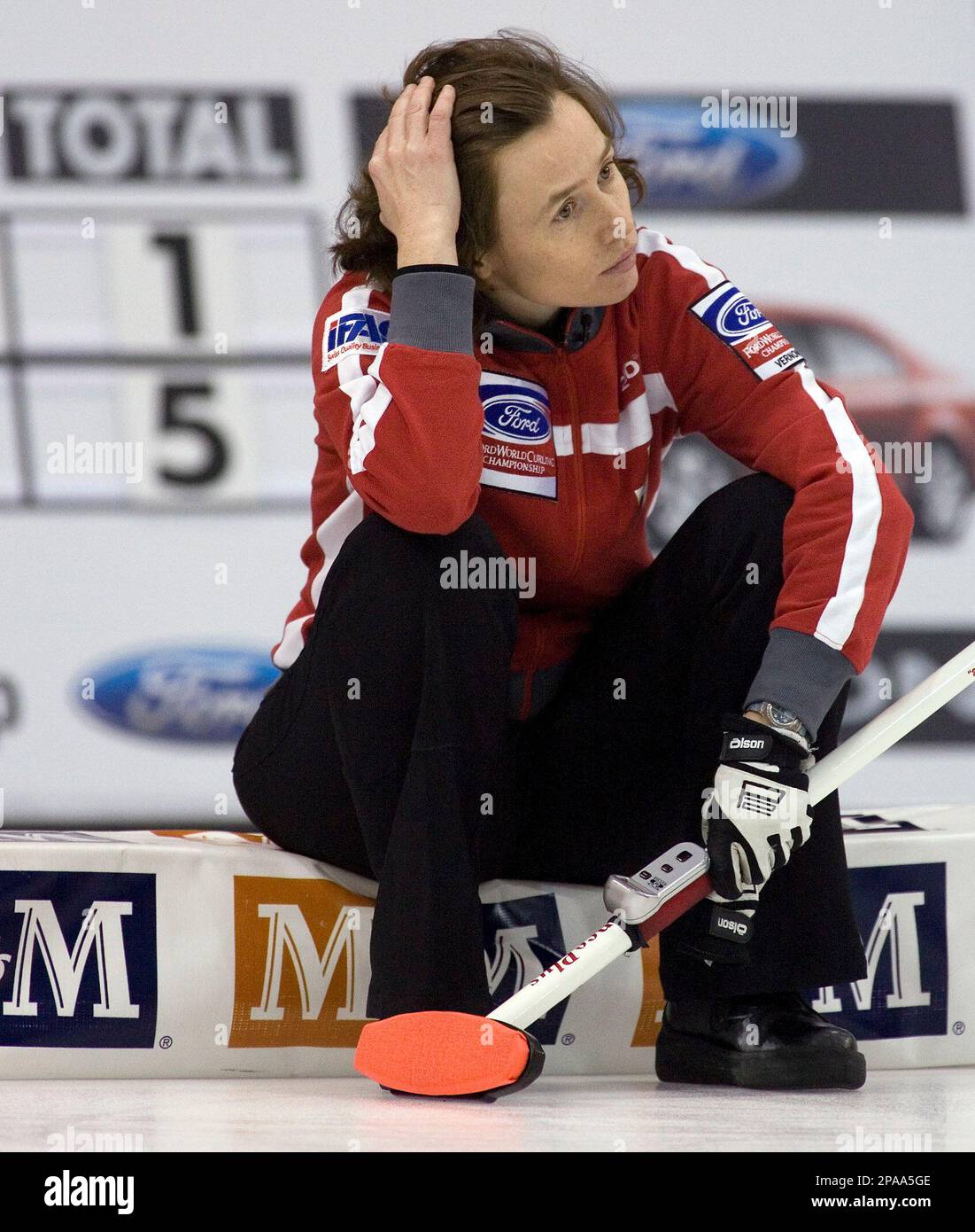 Team Switzerland's skip Mirjam Ott takes a break during game action against Team Japan at the ...