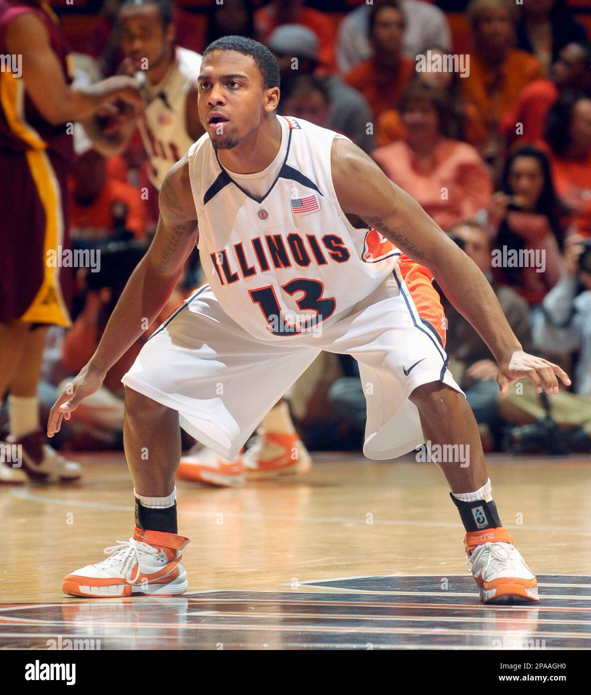 Illinois' Jeff Jordan sets up in defense position during a college ...