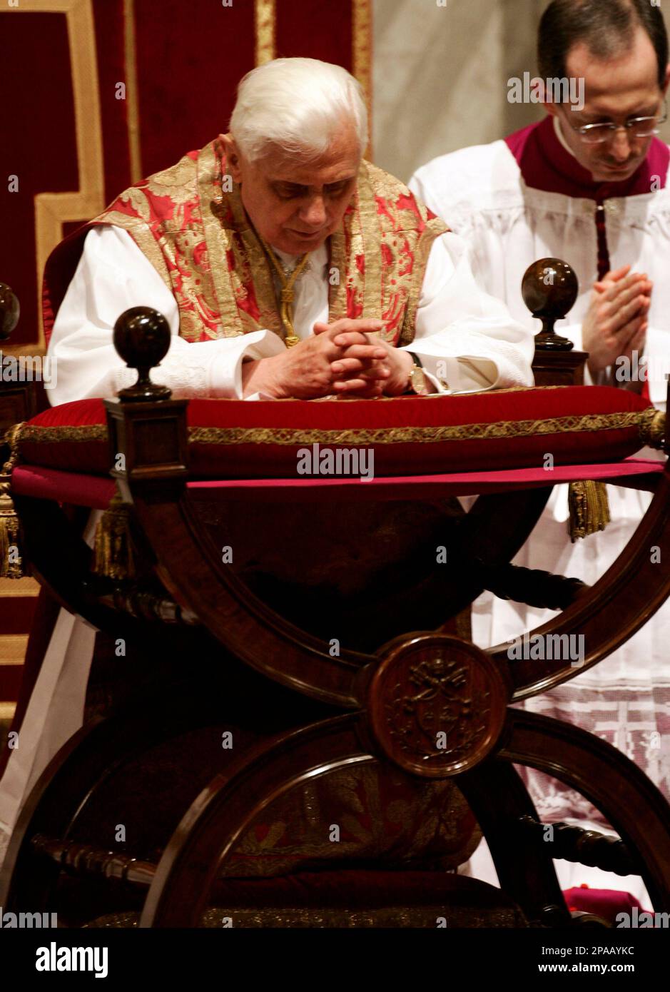 Pope Benedict XVI prays during a Mass for the unveiling and adoration ...