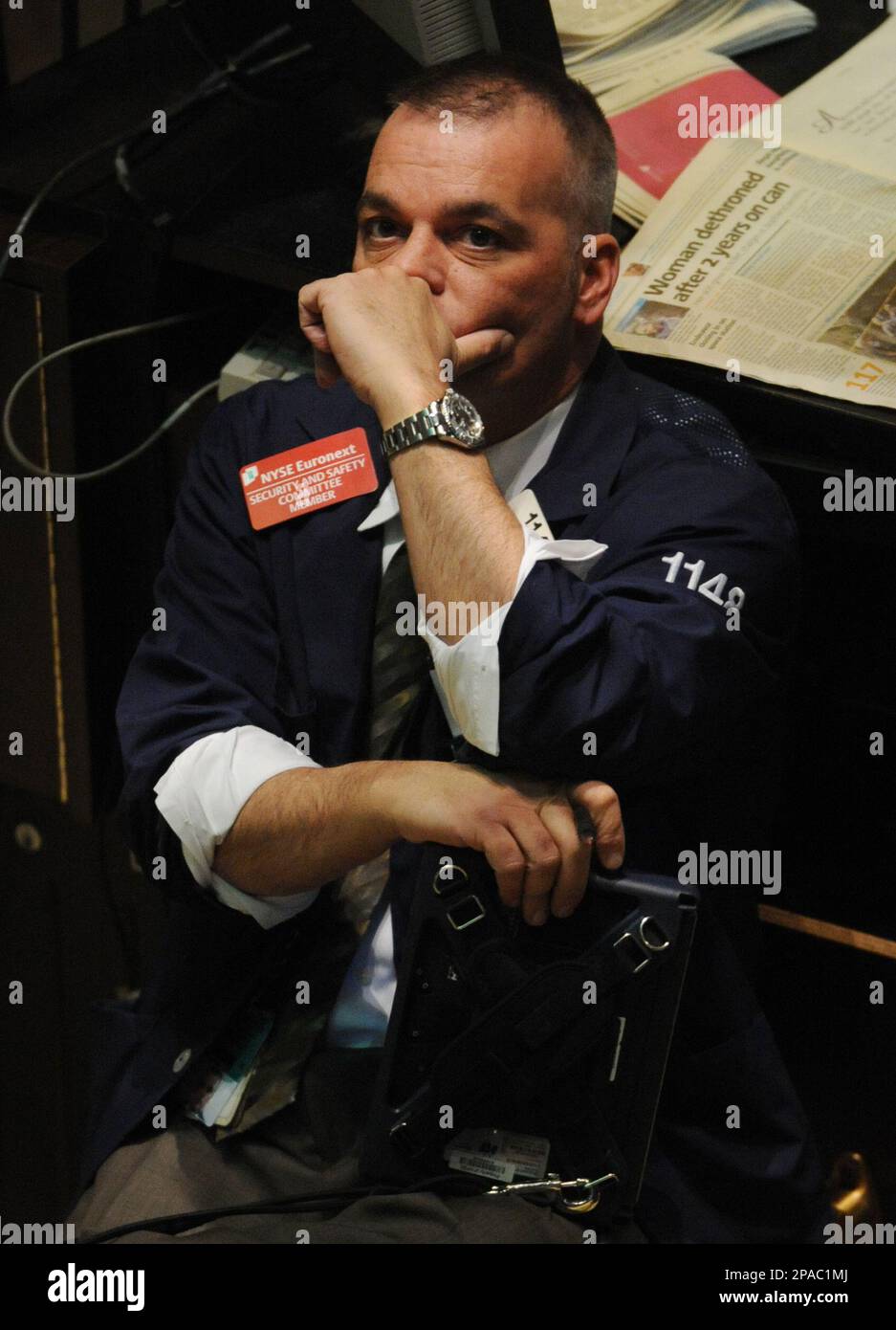 Albert Young watches the early numbers on the floor of the New York ...