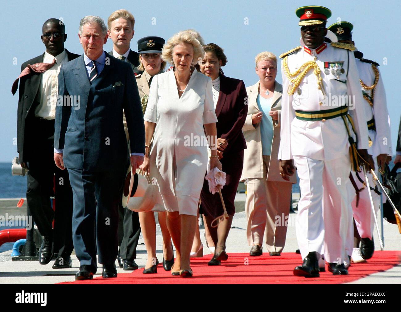 Britain's Prince Charles, left, and the Duchess of Cornwall, center ...