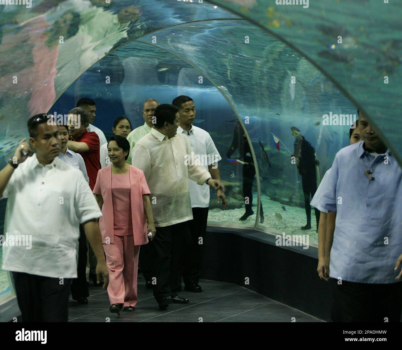 Philippine President Gloria Macapagal Arroyo, second from left,tours ...