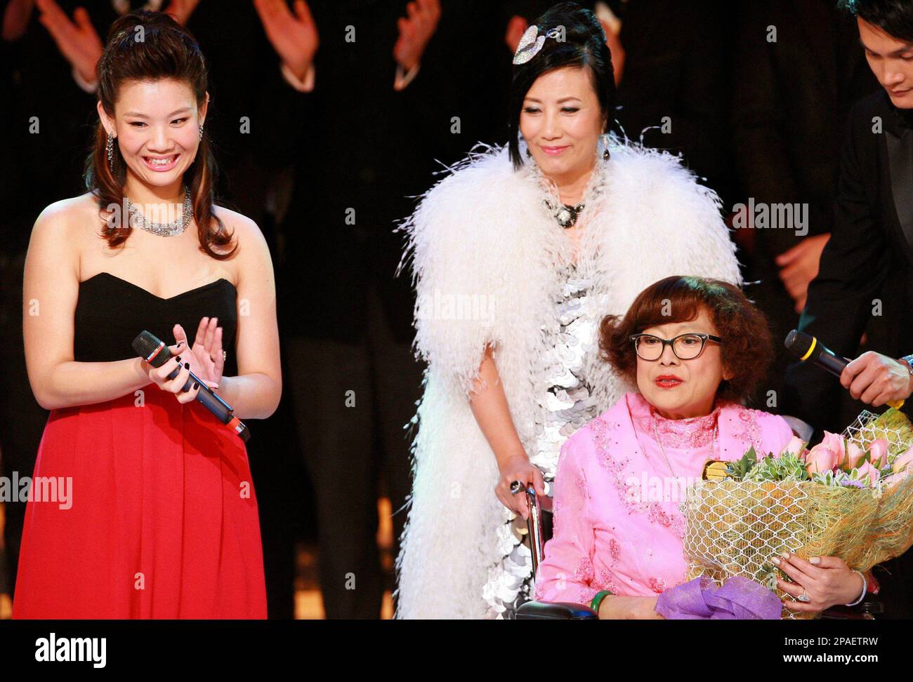** FILE ** Veteran Hong Kong actress Lydia Sum, right, speaks after ...
