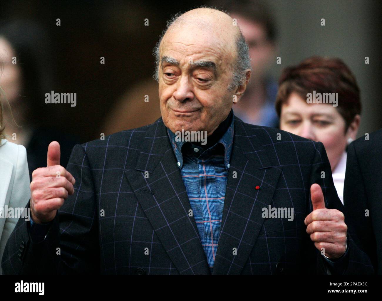 Mohamed Al Fayed, father of Dodi Al Fayed, gestures as he leaves the ...