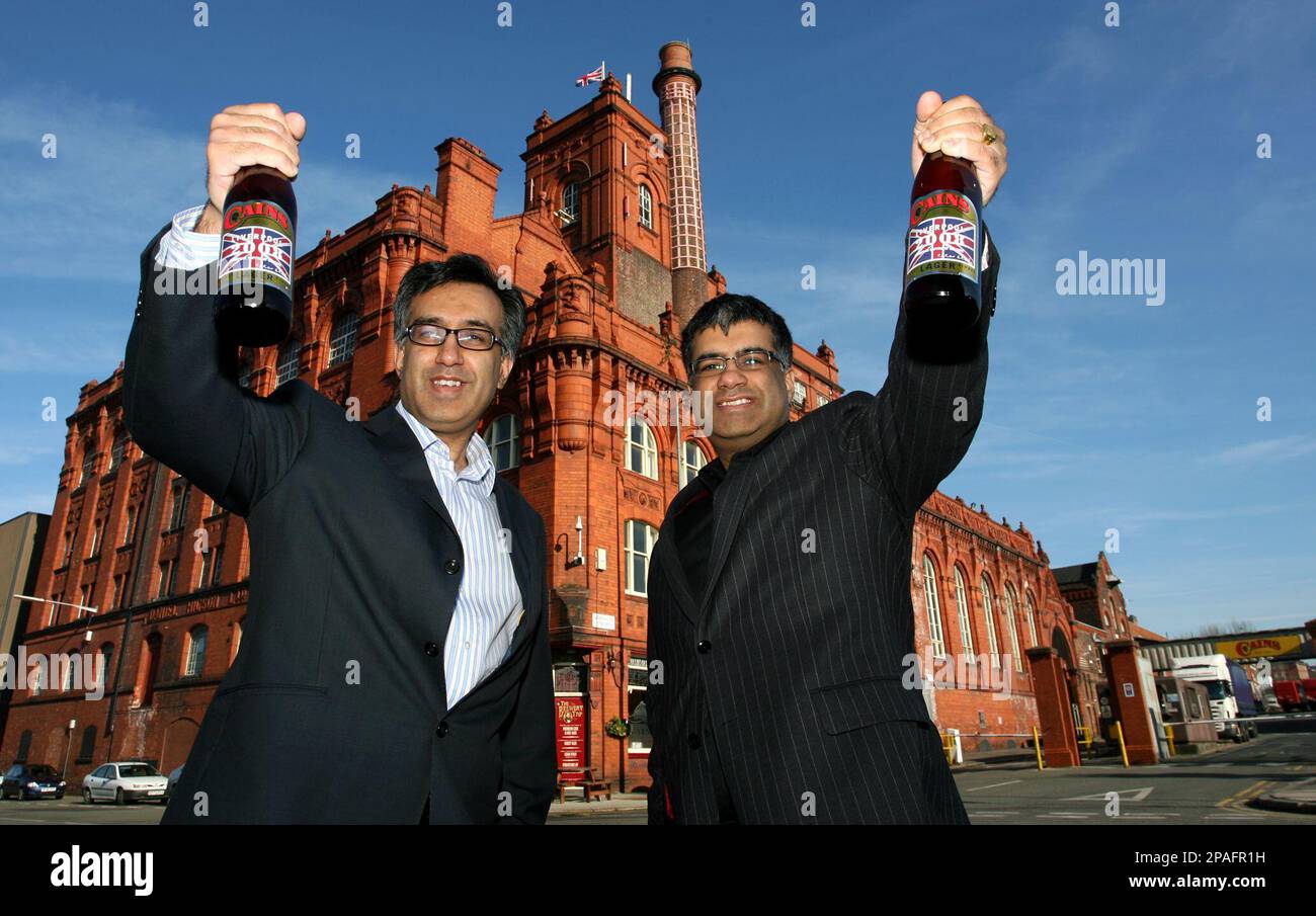 Cains Beers owners and brothers Sudarghara, left and Ajmail Dusanj hold ...