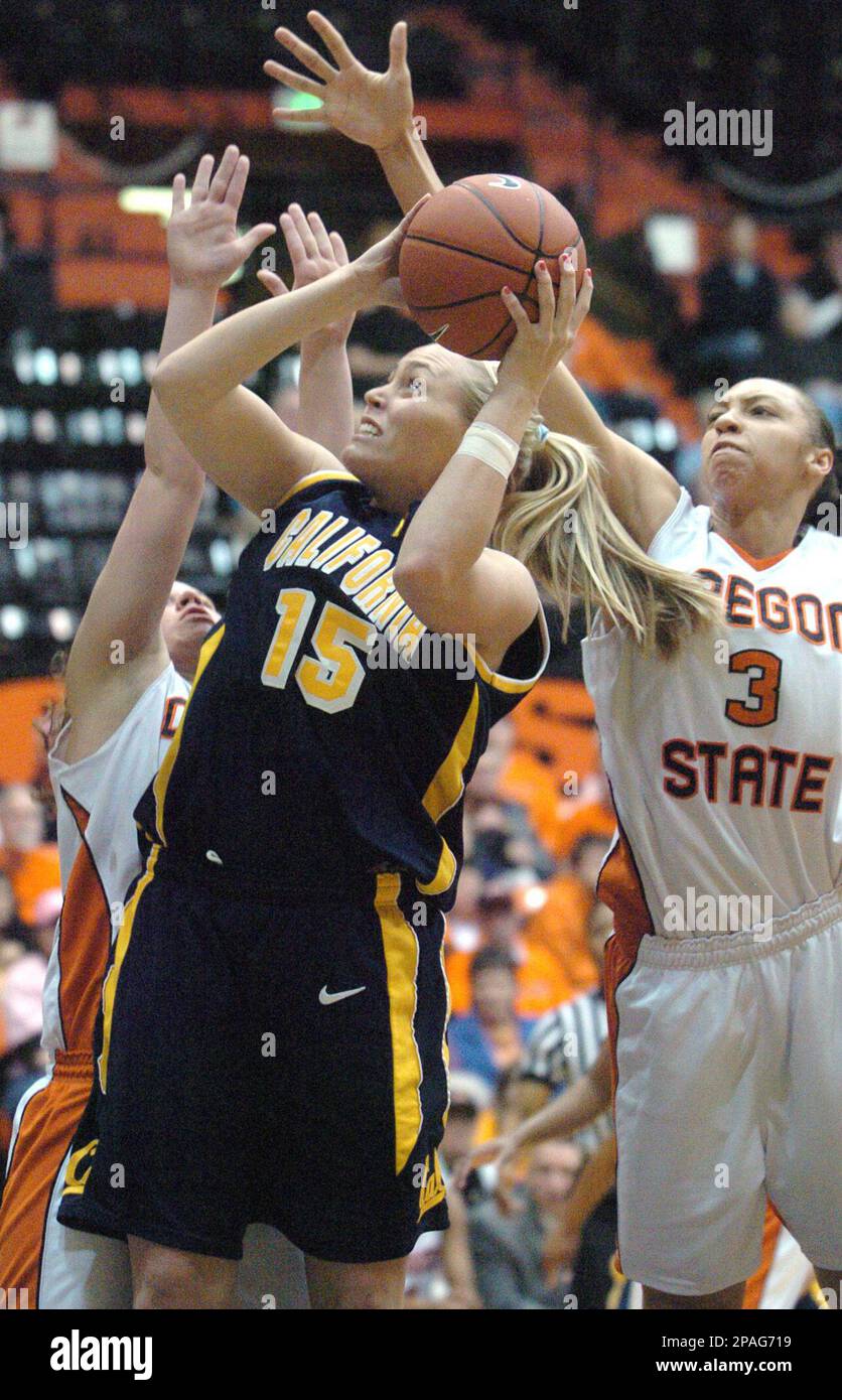 California's Krista Foster (15) tries to shoot against Oregon State's ...
