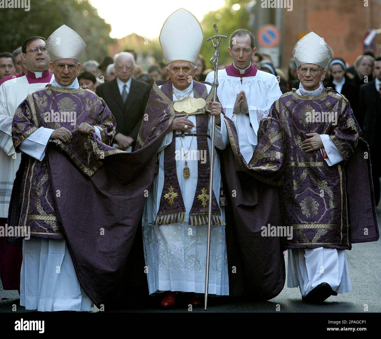Pope Benedict XVI, center, flanked by unidentified prelates, leads an ...