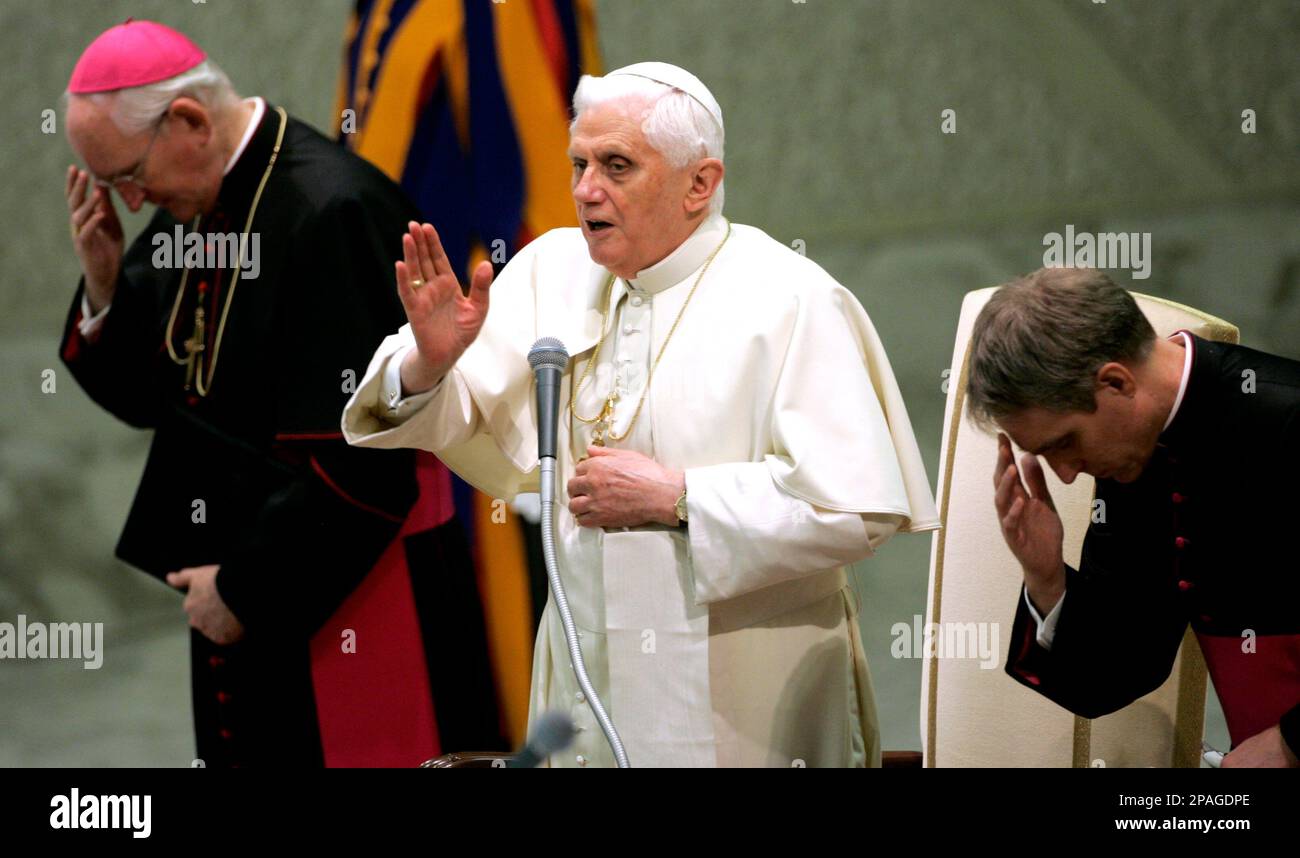 Pope Benedict XVI, flanked by Archbishop James Michael Harvey, Prefect ...