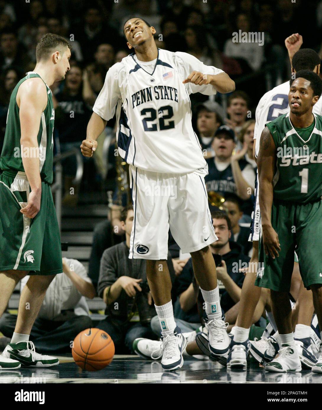 Penn State's Andrew Jones III, center, reacts to being fouled as ...