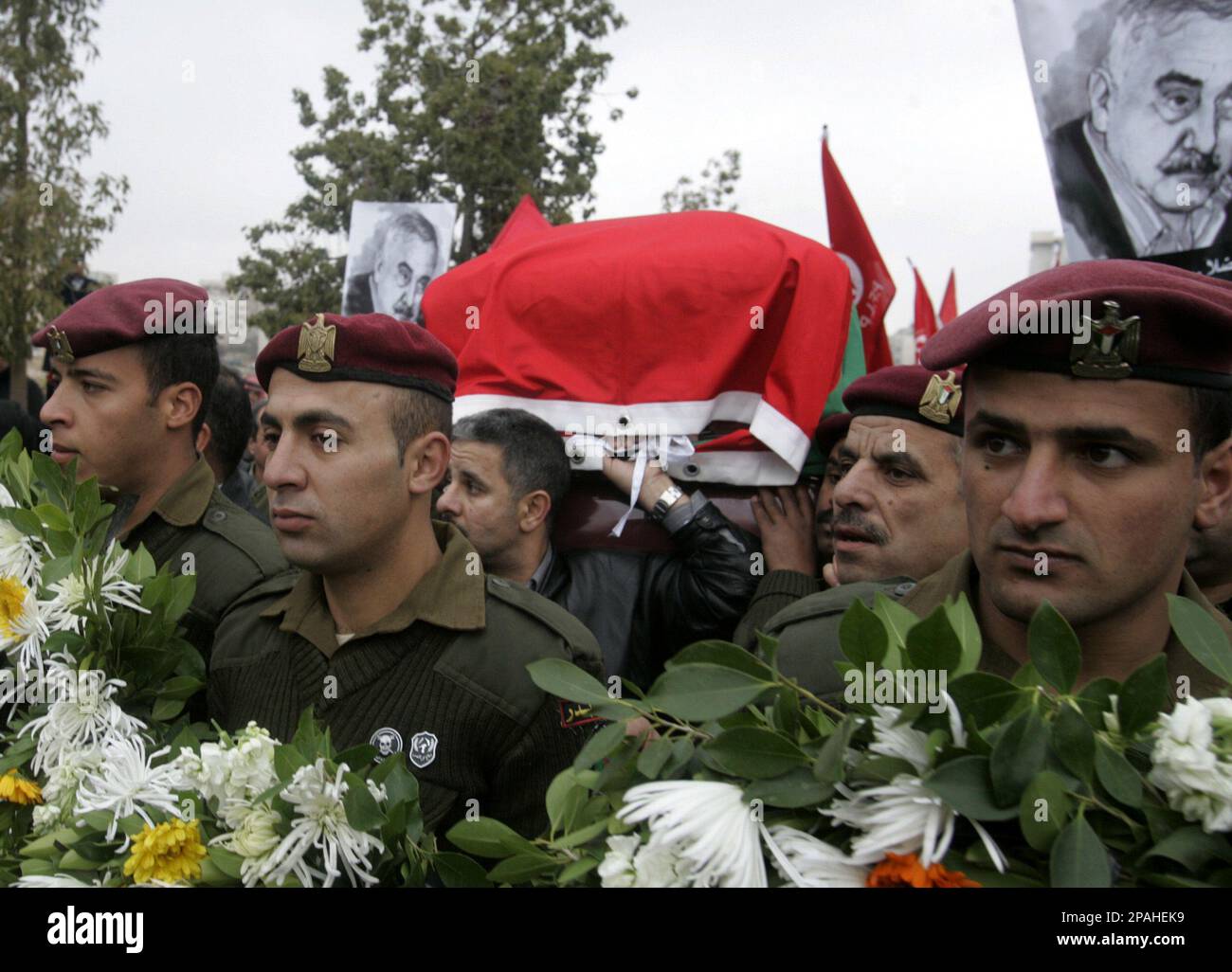 Members of the Jordanian based Palestinian Liberation Army, walk in ...