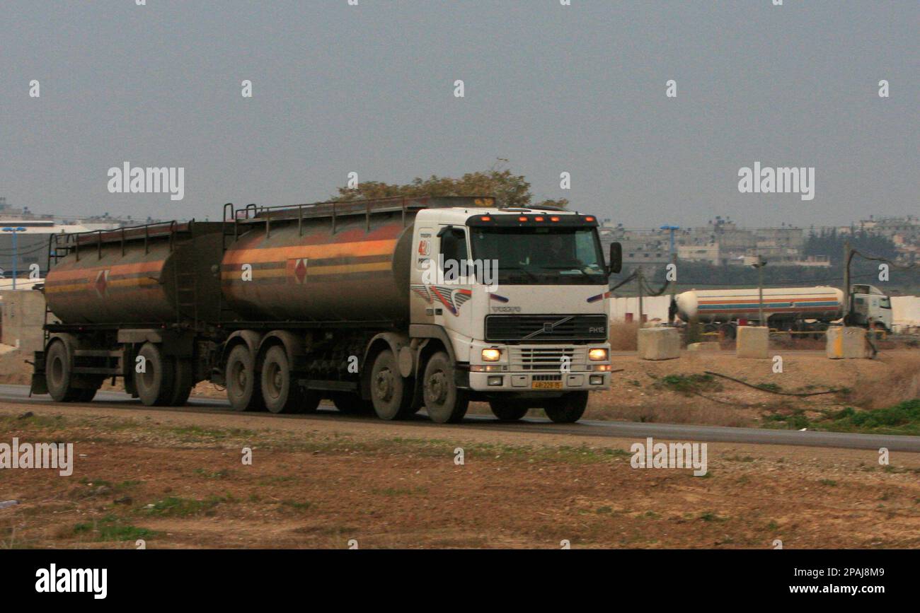 Israeli fuel tankers are seen at Nahal Oz crossing border between ...