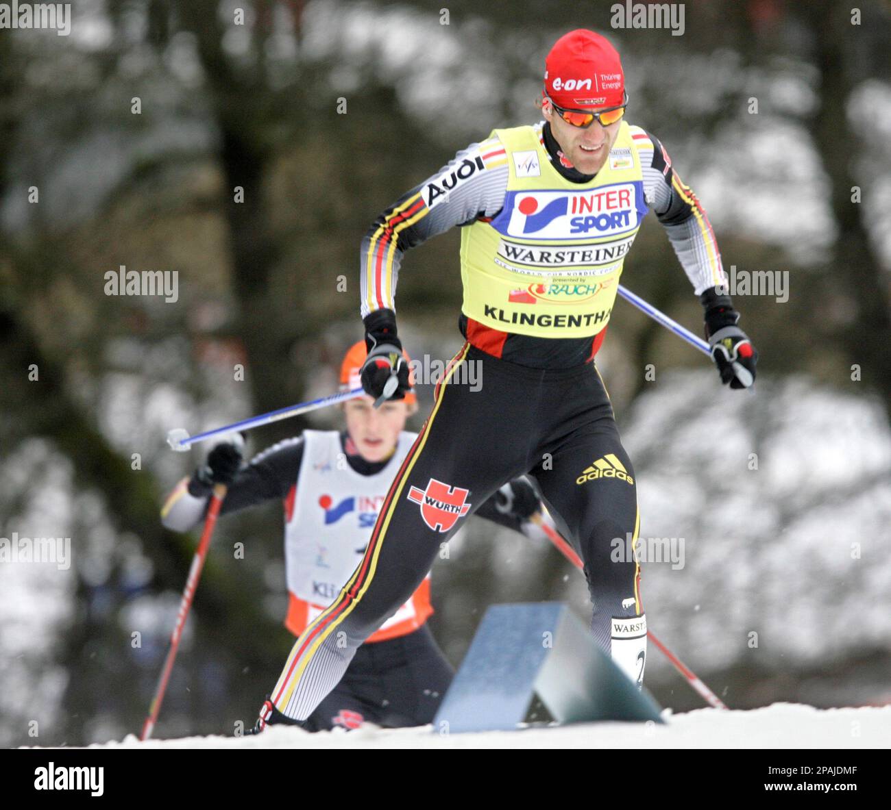 Ronny Ackermann, Germany, right, leads in front of Eric Frenzel ...