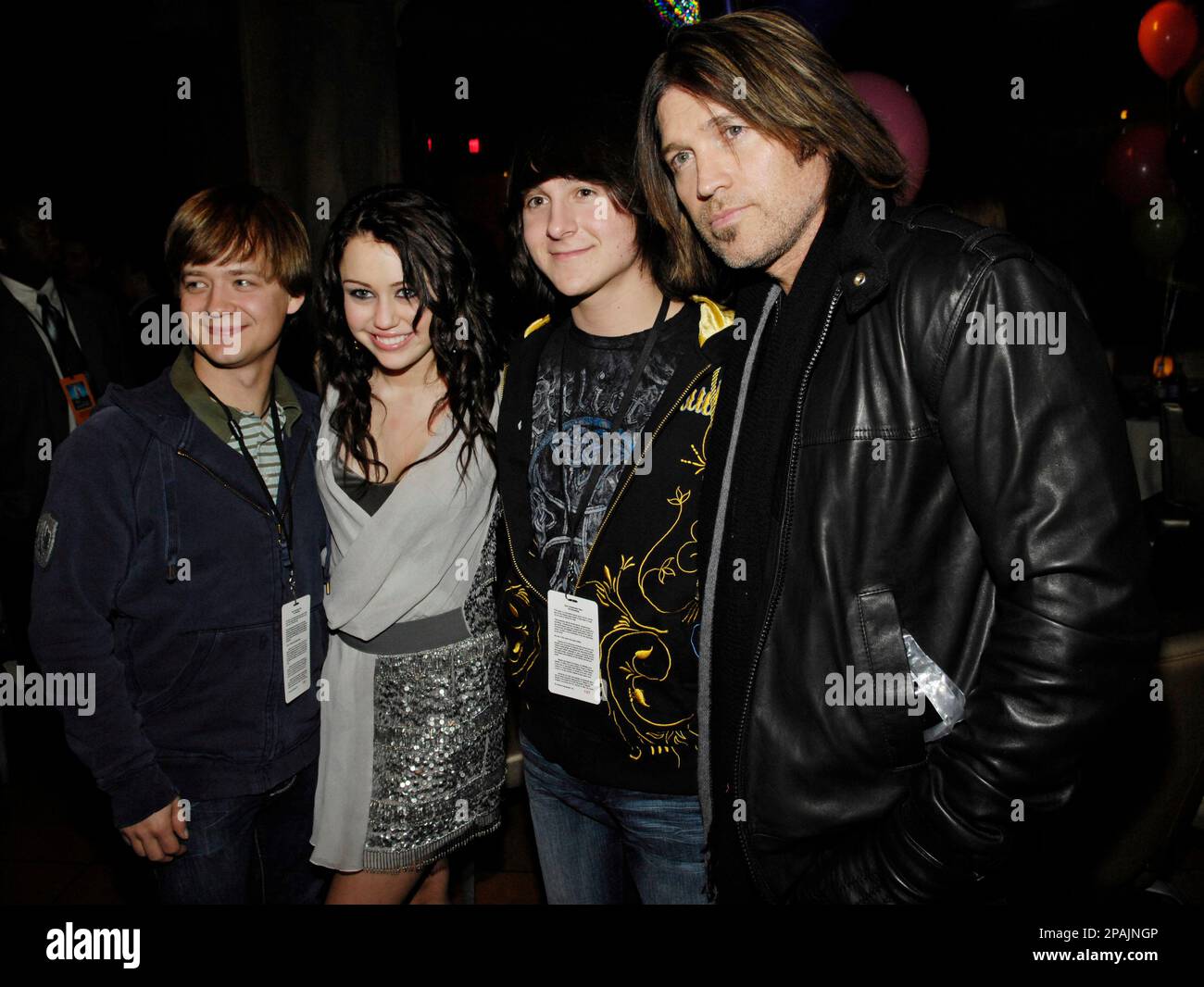 Actress/singer Miley Cyrus, second from left, poses with fellow "Hannah ...