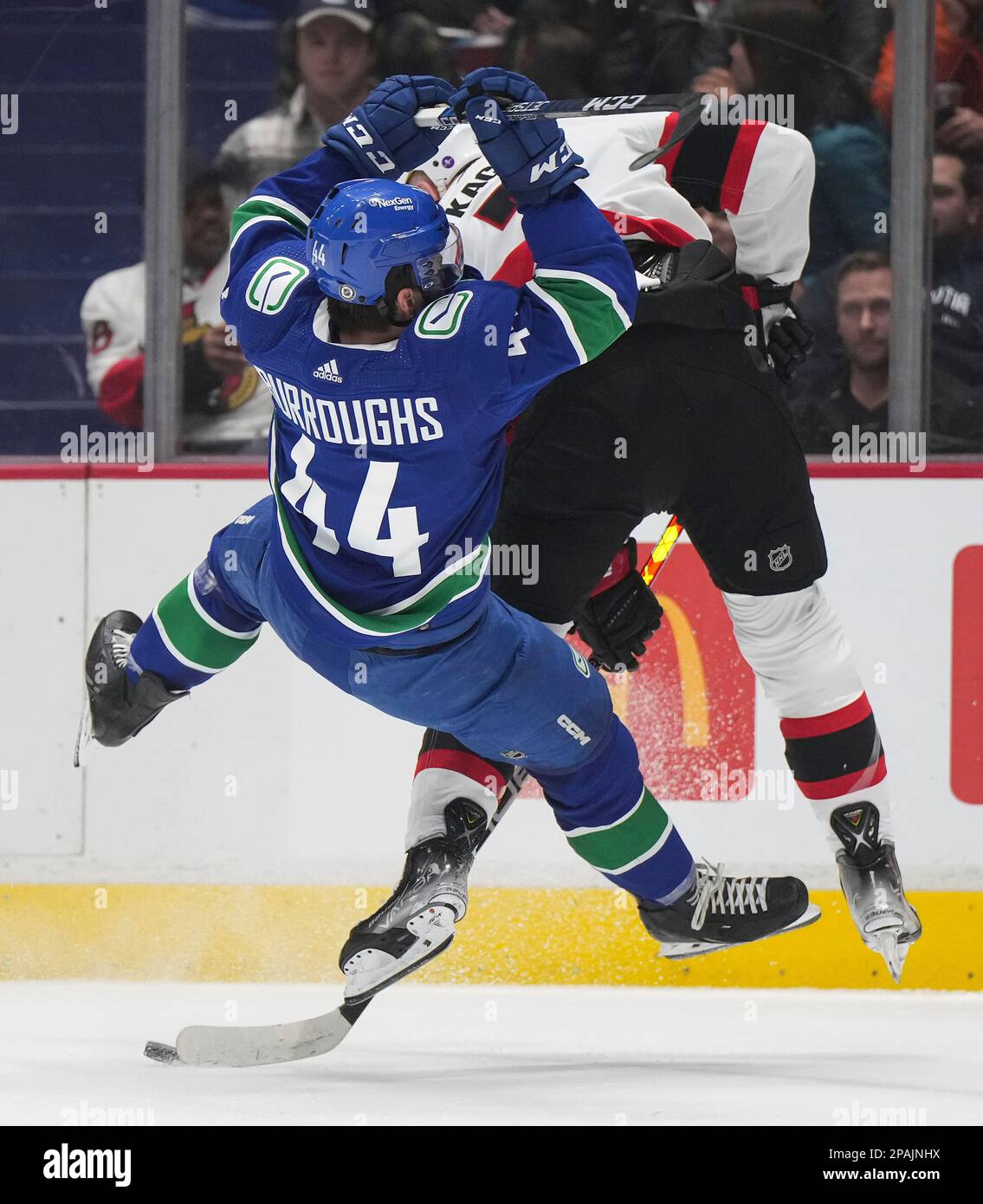 Vancouver Canucks' Kyle Burroughs (44) and Ottawa Senators' Brady ...