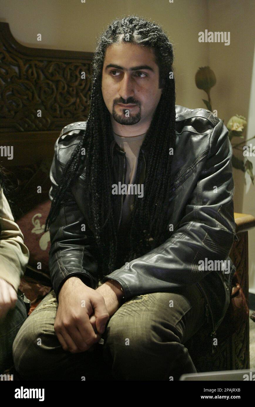 Omar Osama bin Laden is seen during an interview with the Associated ...