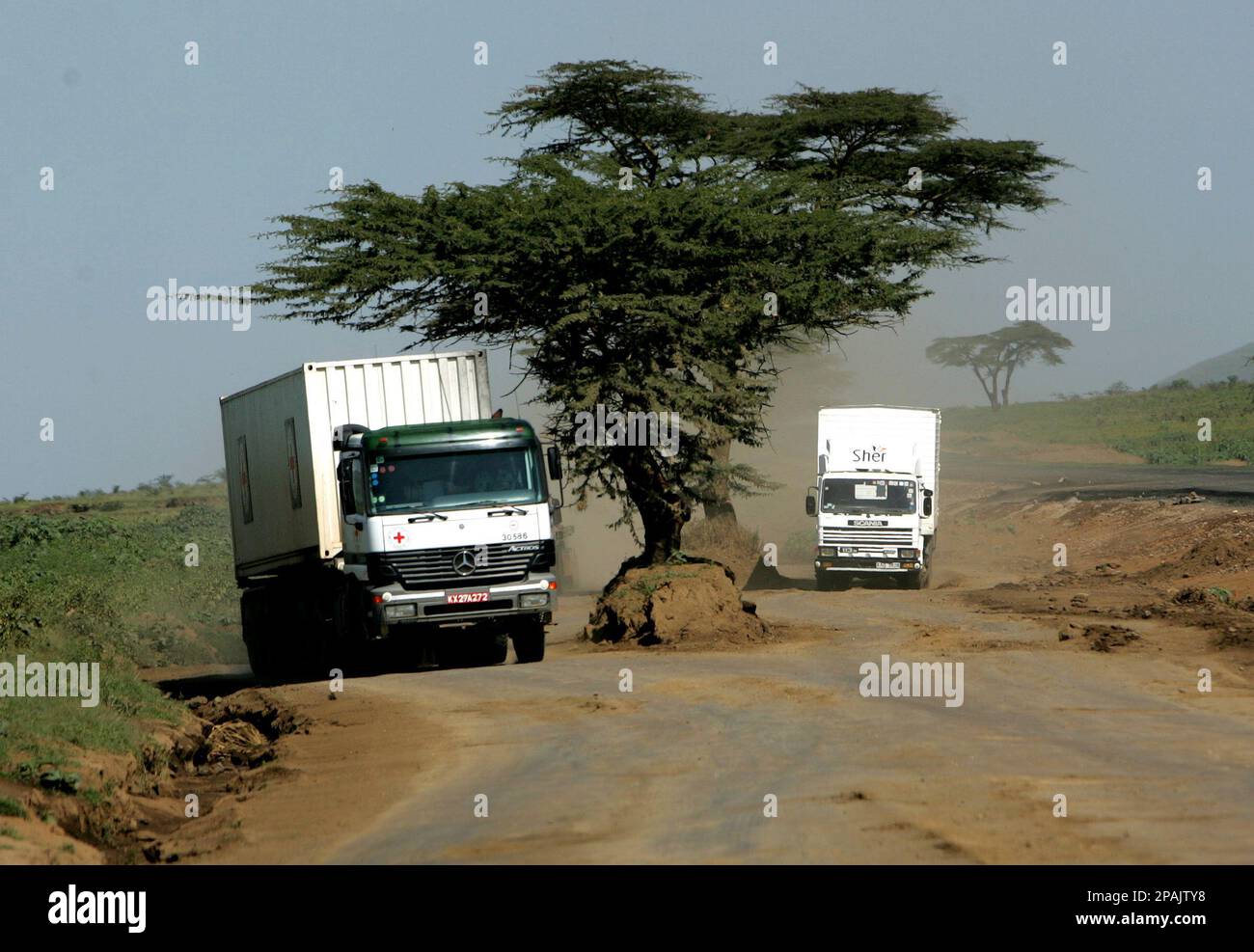 ** FILE ** A Red Cross truck travels on a dirt road, Monday, Feb. 12 ...