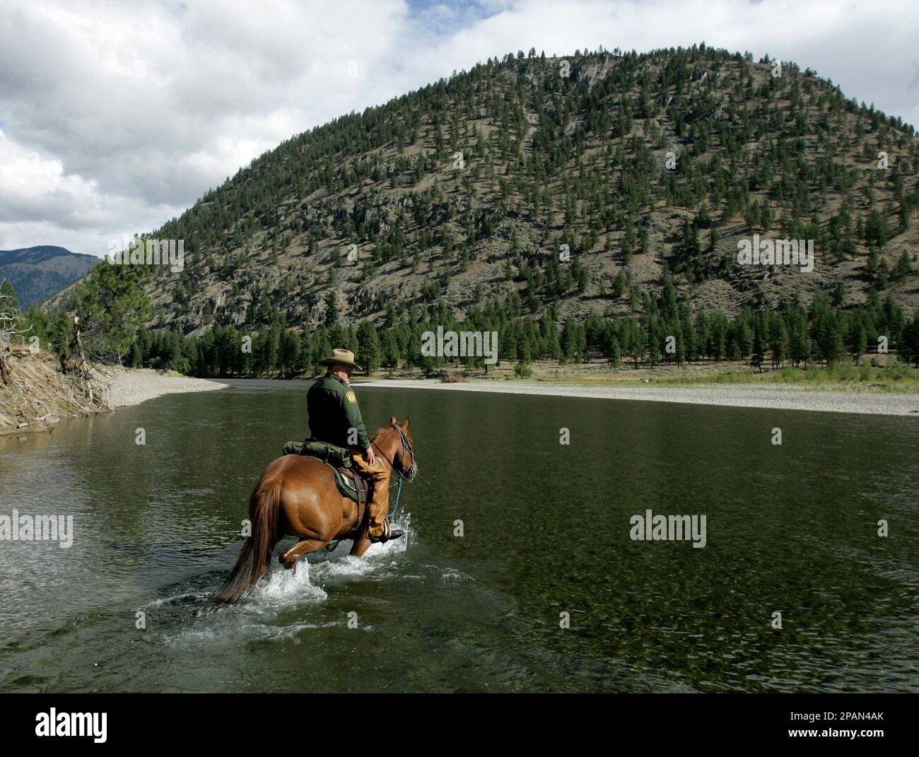 U.S. Border Patrol Agent-in-Charge Richard Graham Jr. crosses the ...