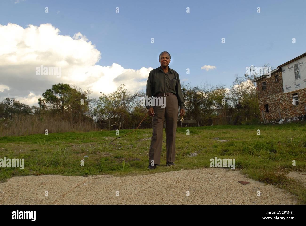 The Rev. Louis Adams stands at the empty lot in the Lower Ninth Ward in ...