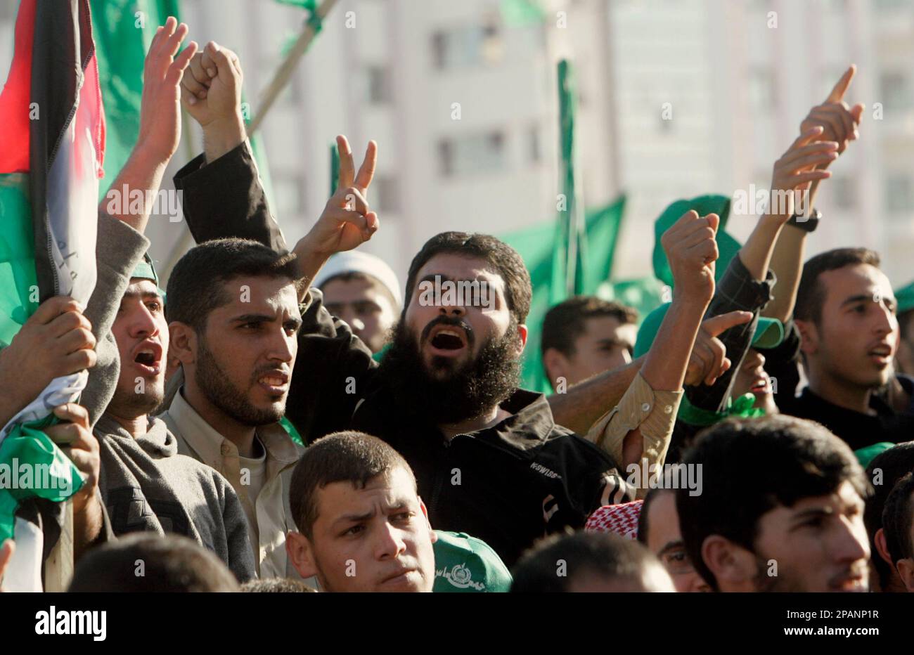 Palestinian Hamas supporters chant slogans as they attend a rally in ...