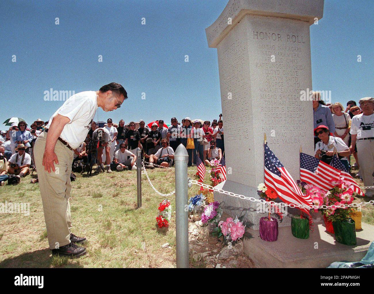 ** FILE ** Min Tonai, of Los Angeles, bows to show respect in this ...