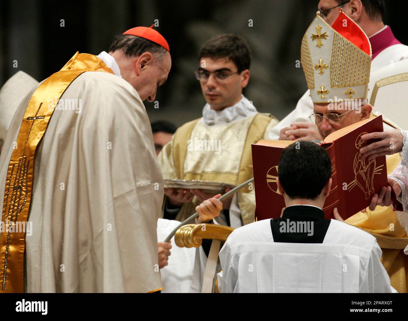 Newly elevated Cardinal Angelo Comastri from Italy receives his golden ...
