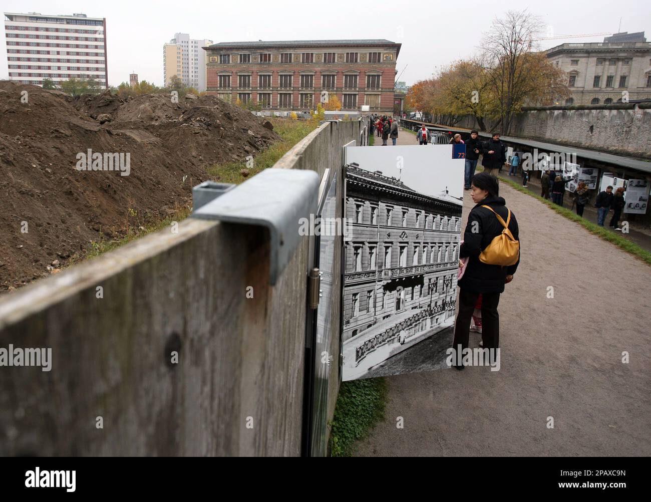 Visitors to the site of the "Topography of Terror" exhibition look at ...