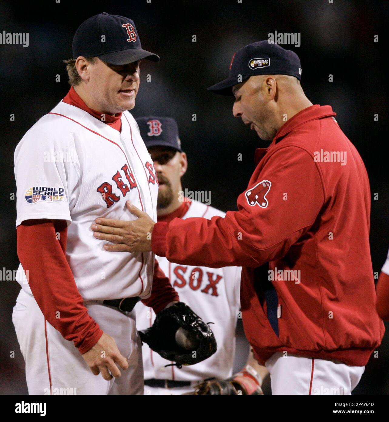 Boston Red Sox manager Terry Francona, right, relieves starting pitcher ...
