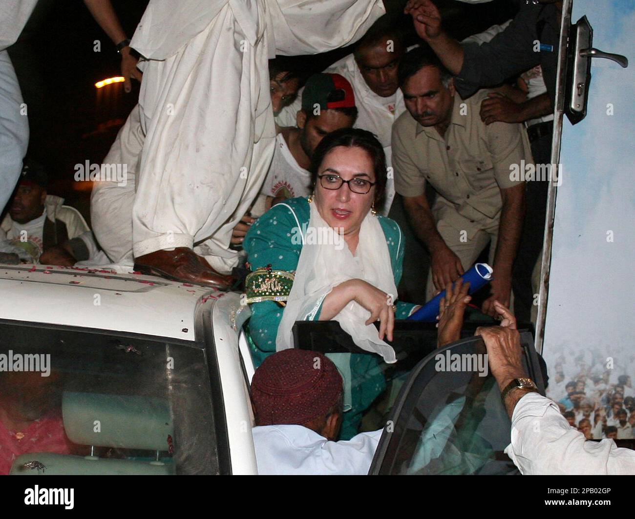 Pakistan's former prime minister Benazir Bhutto is rescued from her ...