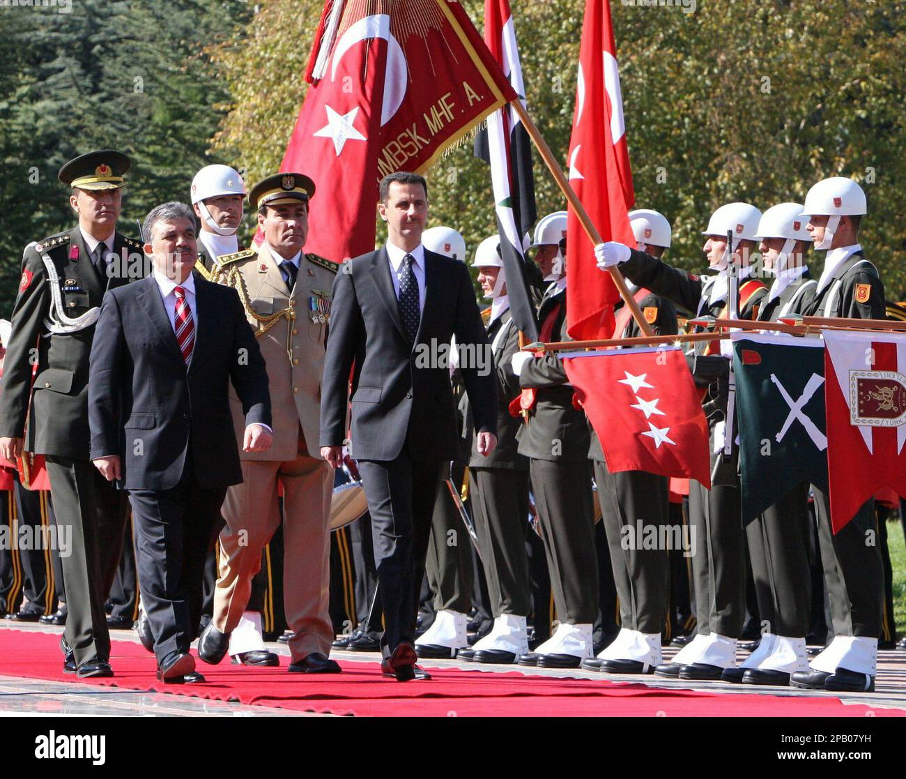 Turkish President Abdullah Gul, second left, and his Syrian counterpart ...