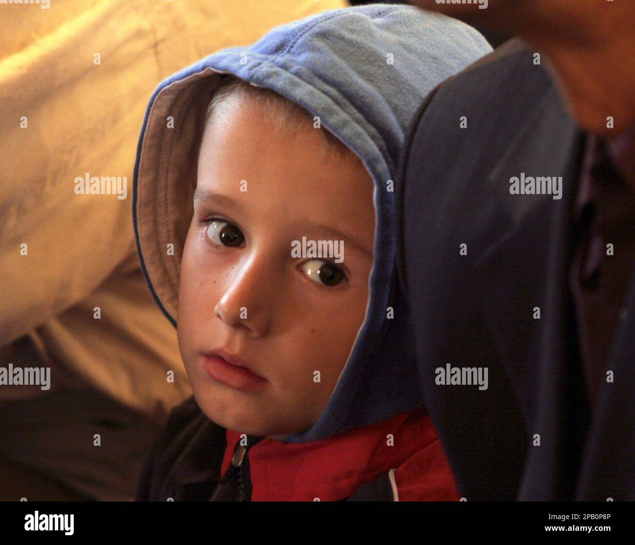 Bosnian Muslim boy says his prayer as he attends the Eid al-Fitr ...