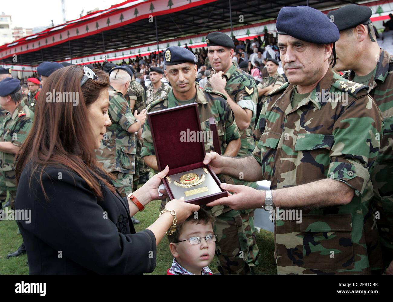 Lebanese Army Commander Gen. Michel Suleiman, gives an honor shield to ...