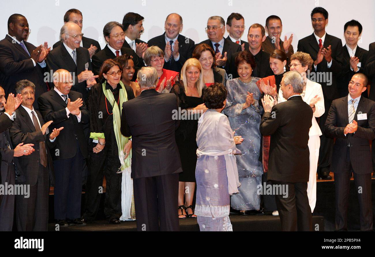 (Foreground facing back, from left) The Aga Khan, wife of Malaysian ...
