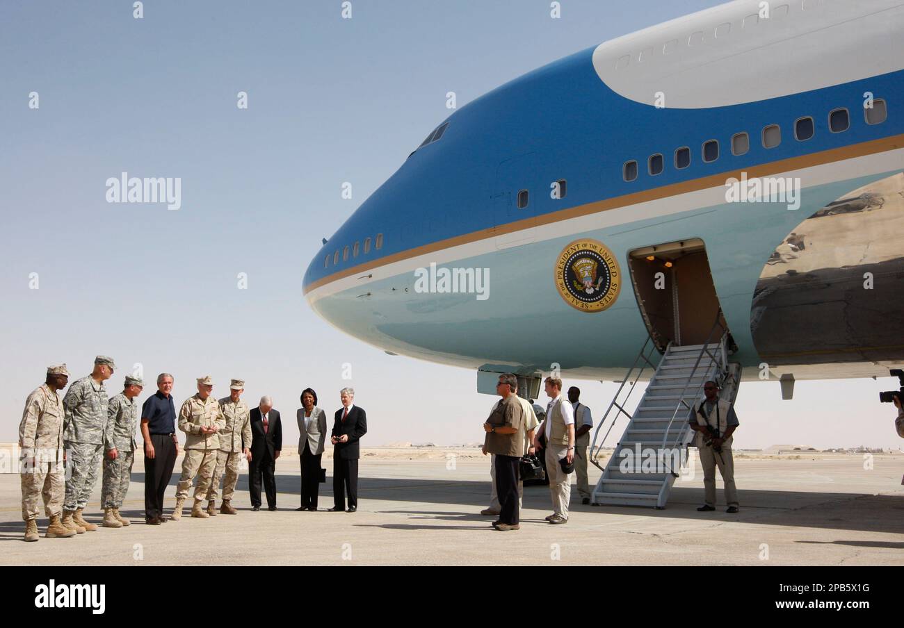 President Bush, fourth from left, arrives at Al-Asad Airbase in Anbar ...