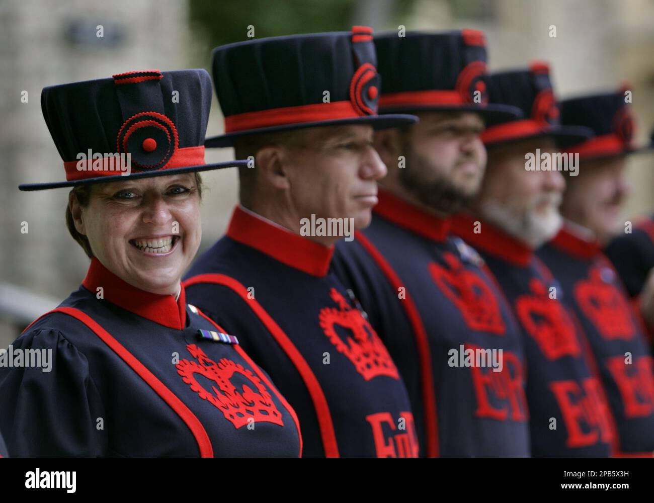 Yeoman Warder Moira Cameron, left, the first female Beefeater, poses ...