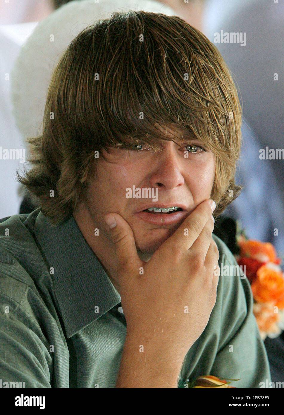 Dale Black's son Corey sheds tears during a funeral service for Dale ...