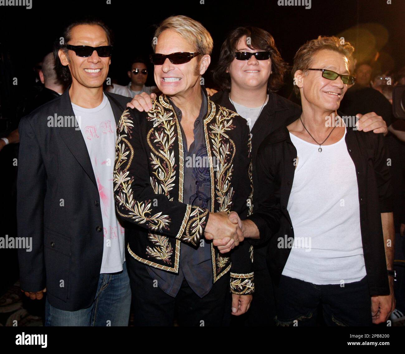 Members of the rock group Van Halen, left to right, Alex Van Halen ...