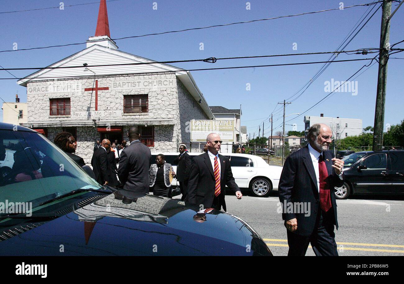New Jersey Gov. Jon S. Corzine, right, leaves the funeral for Iofemi ...