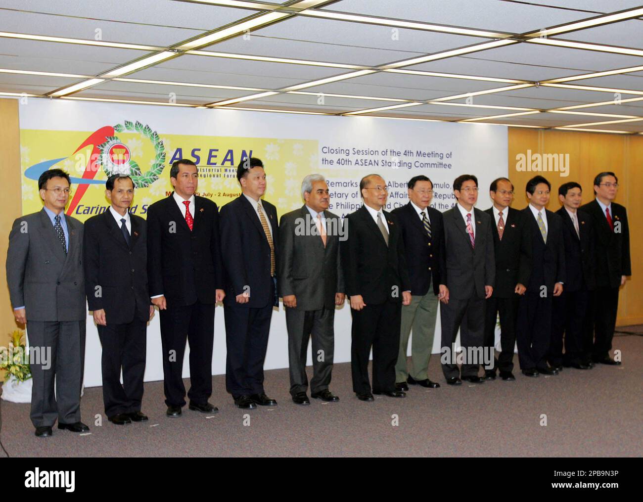 Philippine Secretary of Foreign Affairs Alberto Romulo, sixth from left ...