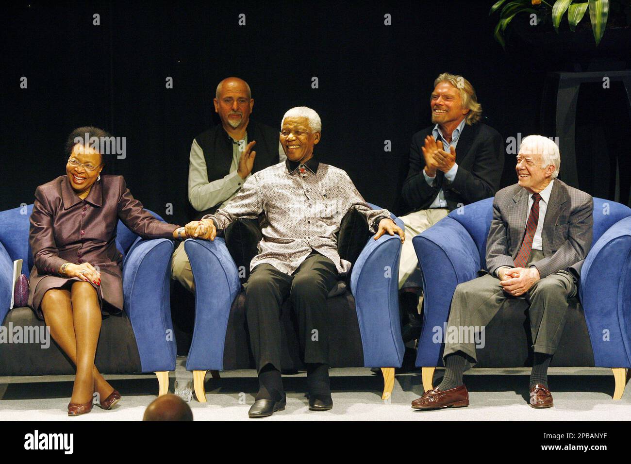 Former South African President Nelson Mandela, flanked from left, by ...