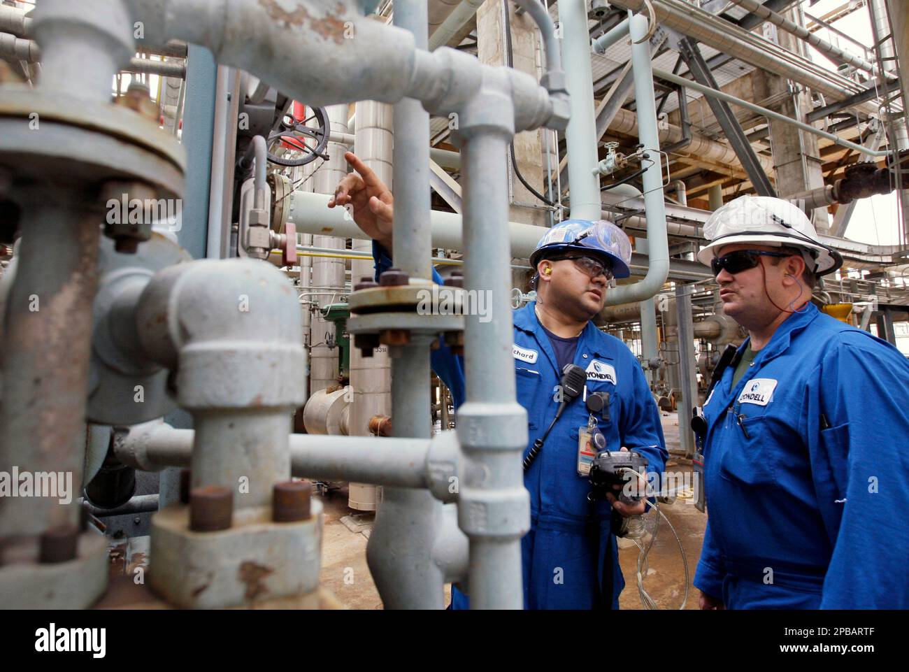 Richard Juarez, left, and Doug Wright, right, take a pressure reading ...