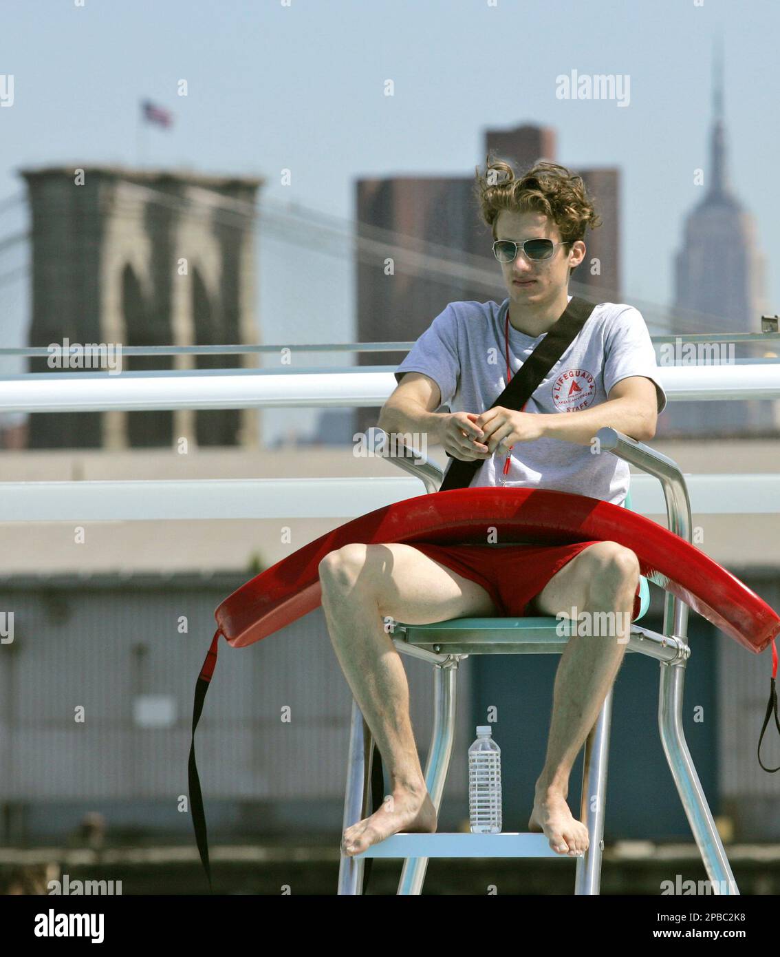The Brooklyn Bridge and Empire State Building are visible behind as a ...