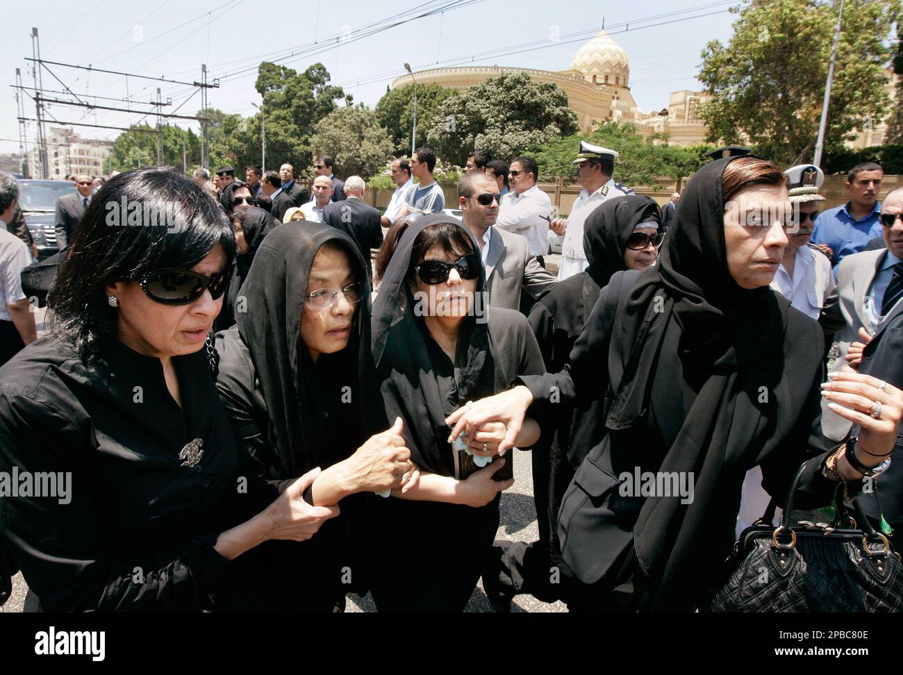 Relatives mourn during the funeral procession of Ashraf Marwan, wealthy ...