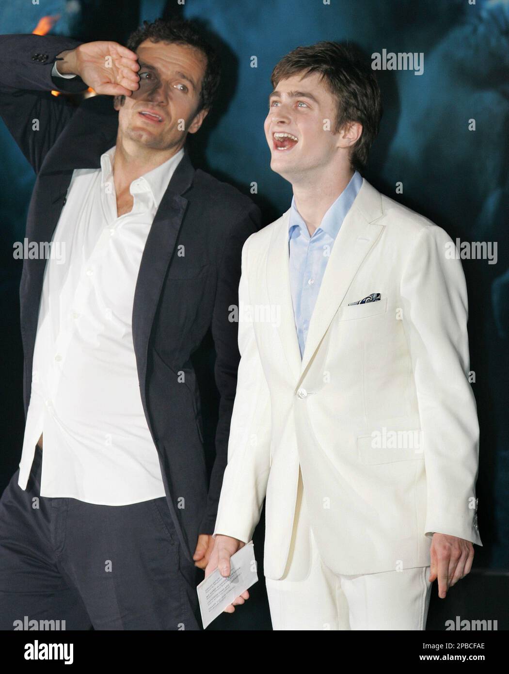 Actor Daniel Radcliffe, right, and producer David Heyman look on during ...