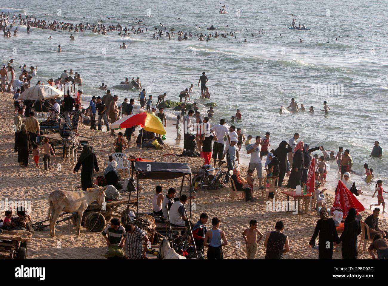 Palestinians enjoy the beach in Gaza City, Friday, June 22, 2007 ...